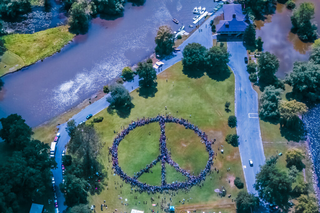 Peacebuilding Within a Global Conflict System - War Prevention Initiative